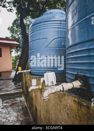 July2nd2025 Dehradun Uttarakhand India. Two large blue water tanks on a ...