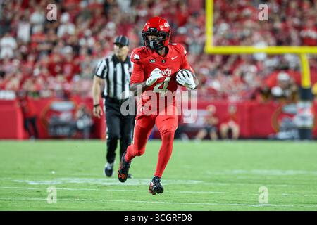 Cincinnati wide receiver Cyrus Allen (4) catches a pass for a first ...