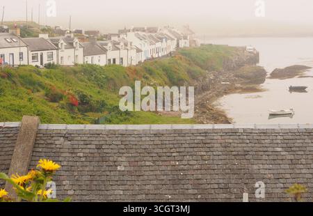 Looking down to the harbour area of Portnahaven, historically built as ...