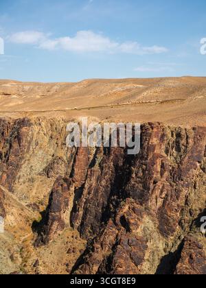 Vast Kazakh steppes meet dramatic canyons with towering cliffs and wind ...