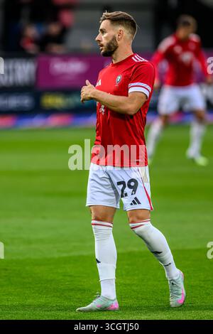 Luke Garbutt of Salford City FC celebrates scoring his side's third ...