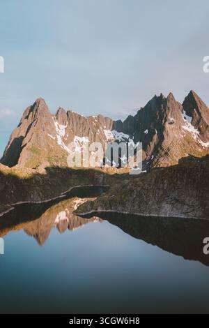 Reflection of mountain in water, Lofoten, Nordland, Norway Stock Photo ...
