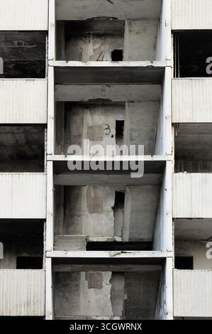 The remains of an apartment building which has been destroyed by fire ...