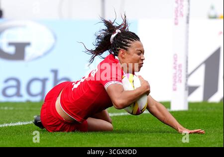 Canada's Asia Hogan-Rochester scores a try during the Women's Rugby ...