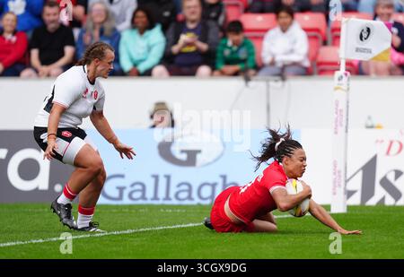 Canada's Asia Hogan-Rochester scores a try during the Women's Rugby ...