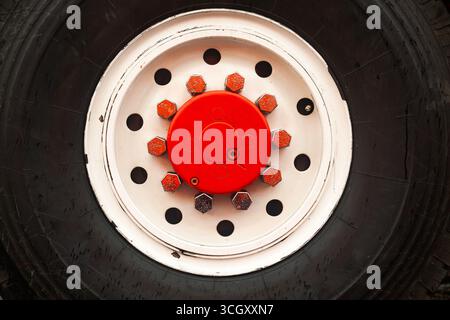 Heavy truck wheel with white disk and red center, close-up Stock Photo ...