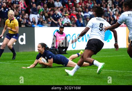 Scotland's Rhona Lloyd scores a try during the Women's Rugby World Cup ...