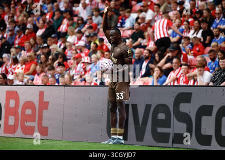 Michael Kayode of Brentford takes long throw in during the Premier ...