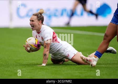 England's Megan Jones celebrates scoring a try during the Women's Rugby ...