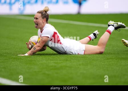 England's Megan Jones celebrates scoring a try during the Women's Rugby ...