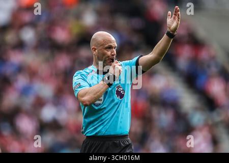 Referee Anthony Taylor gives instructions during the Premier League ...