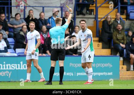 Richard Smallwood of Tranmere Rovers FC tackles Jake Bickerstaff of ...