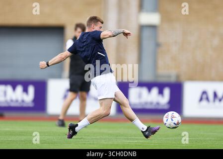 Jack Barham, of Chelmsford City, warming up before the match between ...