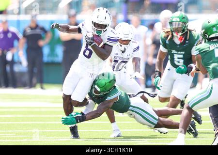 Tulane Green Wave safety Jack Tchienchou (1) celebrates after a ...