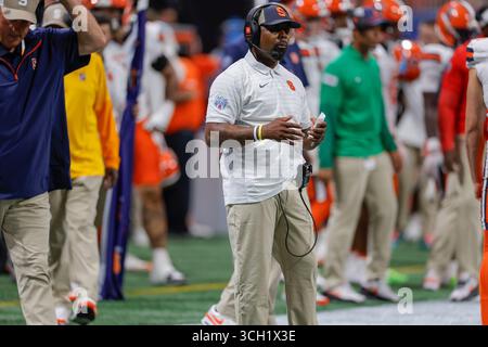 Syracuse head coach Fran Brown heads off the field after defeating ...