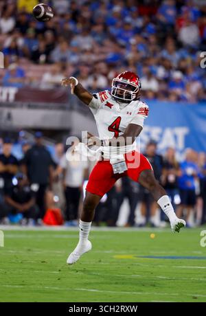 Utah quarterback Devon Dampier (4) throws a pass during an NCAA ...