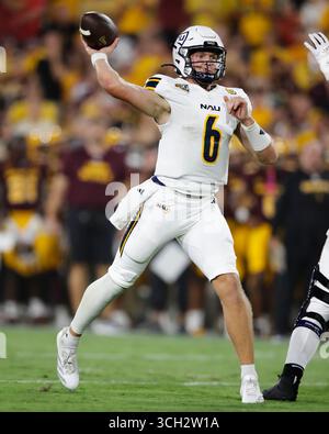 Northern Arizona quarterback Ty Pennington throws against Arizona State ...