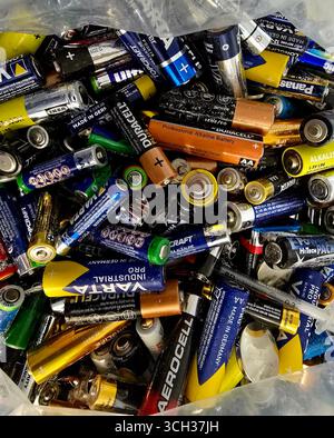 Different types of batteries on black background, flat lay Stock Photo ...