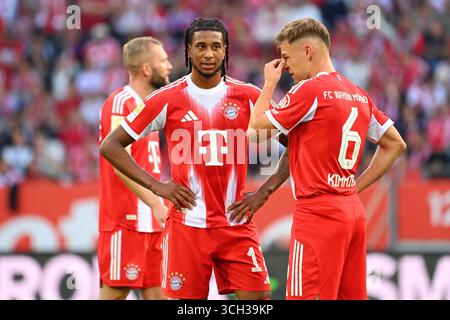 from left Michael Olise (Bayern), Dimitrios Giannoulis Munich, January ...