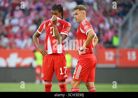 From left: Michael Olise (Bayern), referee Florian Exner, Alexis Claude ...