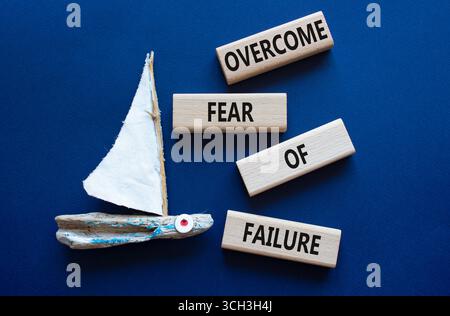 Fear of failure symbol. Wooden blocks with words 'fear of failure ...