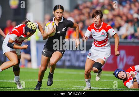 New Zealand's Braxton Sorensen-McGee kicks the ball to convert a try ...