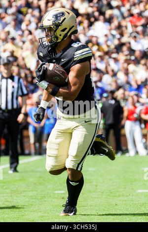 August 30, 2025: Purdue running back Antonio Harris (22) runs with the ...