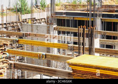 Unfinished concrete column under tower construction with protruded ...