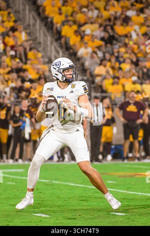 Northern Arizona quarterback Ty Pennington throws against Arizona State ...