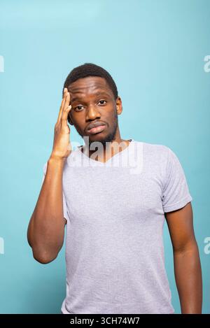 African man feeling relief portrait , satisfied person relaxed and ...