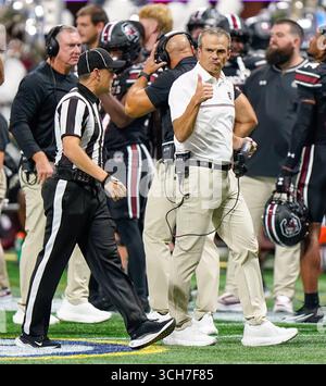 South Carolina head coach Shane Beamer looks up at the scoreboard ...