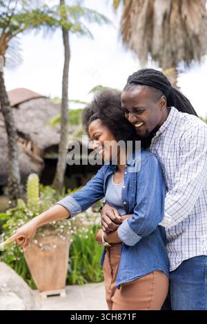 Positive African American Couple Pointing At Camera With Two Hands ...