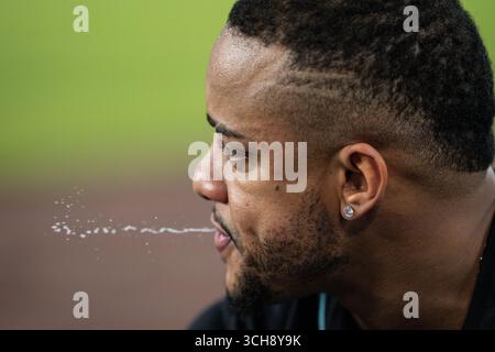 Arizona Diamondbacks' Ketel Marte, second from left, hits a solo home ...