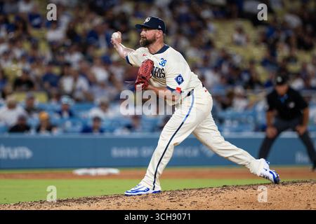 Los Angeles Dodgers pitcher Kirby Yates throws to a San Francisco ...