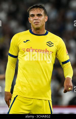 Giovane Santana do Nascimento of Hellas Verona and Antoine Hainaut of Venezia FC seen in action ...