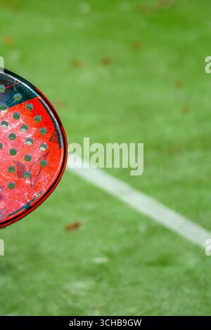 Top view of a professional paddle tennis player who is going to hit the ...