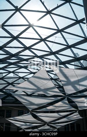 Geometric Ceiling Design with Triangular Panels and Recessed Lighting ...