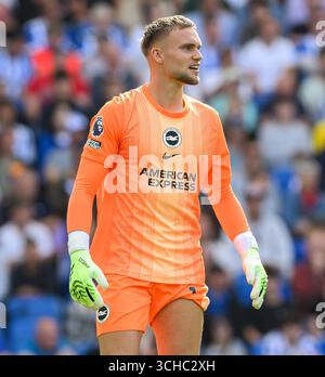 Brighton and Hove Albion goalkeeper Bart Verbruggen (right) and team ...