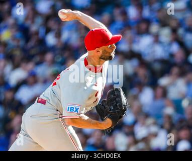 Philadelphia Phillies pitcher Tim Mayza looks at the pitcher during a ...