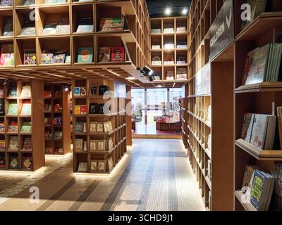Kuala Lumpur, Malaysia - March 3, 2025: Innovative wooden shelves fill ...