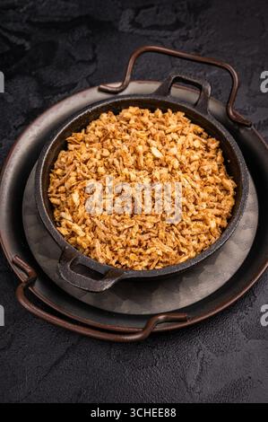 Crispy Fried dried Onion Bits isolated on white background. top view ...