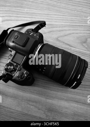 Digital mirrorless camera on the wooden table Stock Photo - Alamy