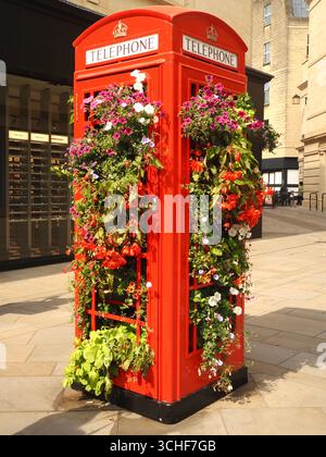 Re-purposed telephone kiosk with display of Summer flowers, Bath ...