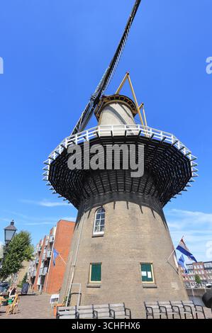 Traditional Dutch windmill on Aelbrechtskolk canal, Korenmolen de ...