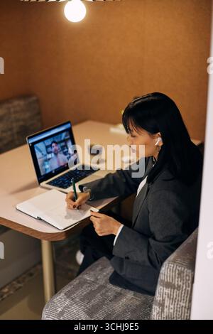 Group of multiracial business people are writing the plans and ideas ...