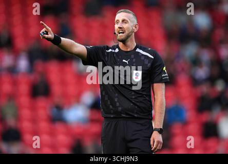 Referee Jamie O'Connor during the The Vertu Trophy Group G match Port ...