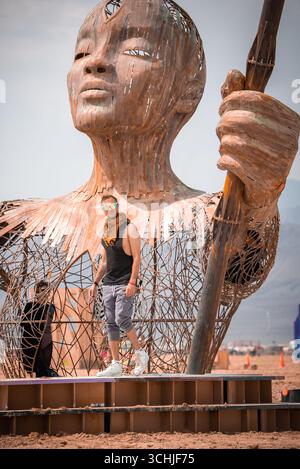 Large Wooden Human Sculpture at Burning Man Festival in Nevada Desert ...