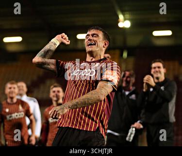 Andy Cook of Bradford City celebrates his goal to make it 3-1 during ...