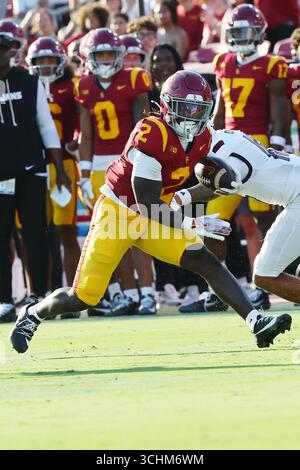 USC Trojans running back Waymond Jordan (2) is tackled during the NCAA ...