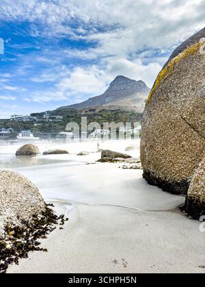 An aerial shot of Cape Lookout beach in front of a wavy sea in foggy ...